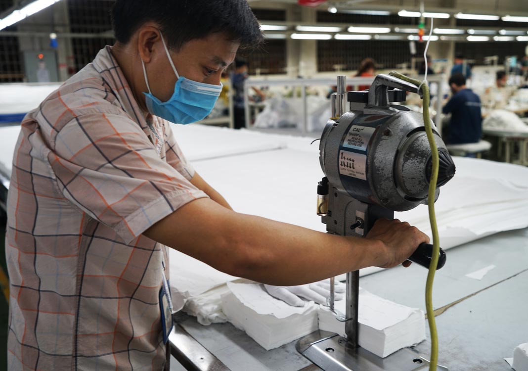 Inside face mask production facility - The Saigon Times